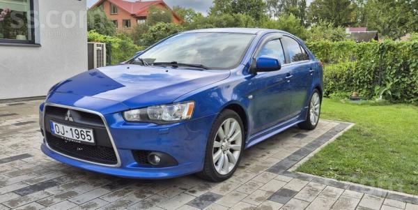 Zils Mitsubishi Lancer 2009 Rīga, ar dzinēja tilpumu 1.80 L un nobraukumu 297 tūkst. km par 3200 €, foto 2 vietnē AUTOMOTO.COM.LV