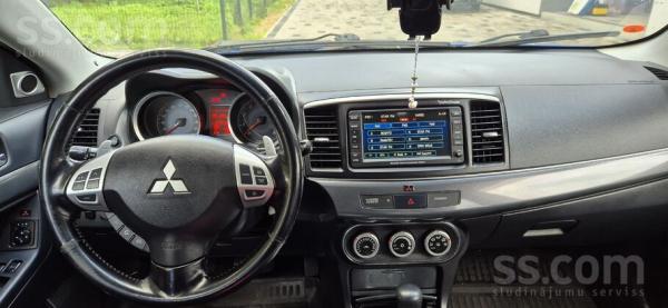 Zils Mitsubishi Lancer 2009 Rīga, ar dzinēja tilpumu 1.80 L un nobraukumu 297 tūkst. km par 3200 €, foto 5 vietnē AUTOMOTO.COM.LV
