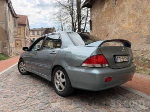 Blue Mitsubishi Lancer 2006 in Cesis, with an engine capacity of 1.60 L and mileage of 198 thousand km for 1290 €, photo  on AUTOMOTO.COM.LV