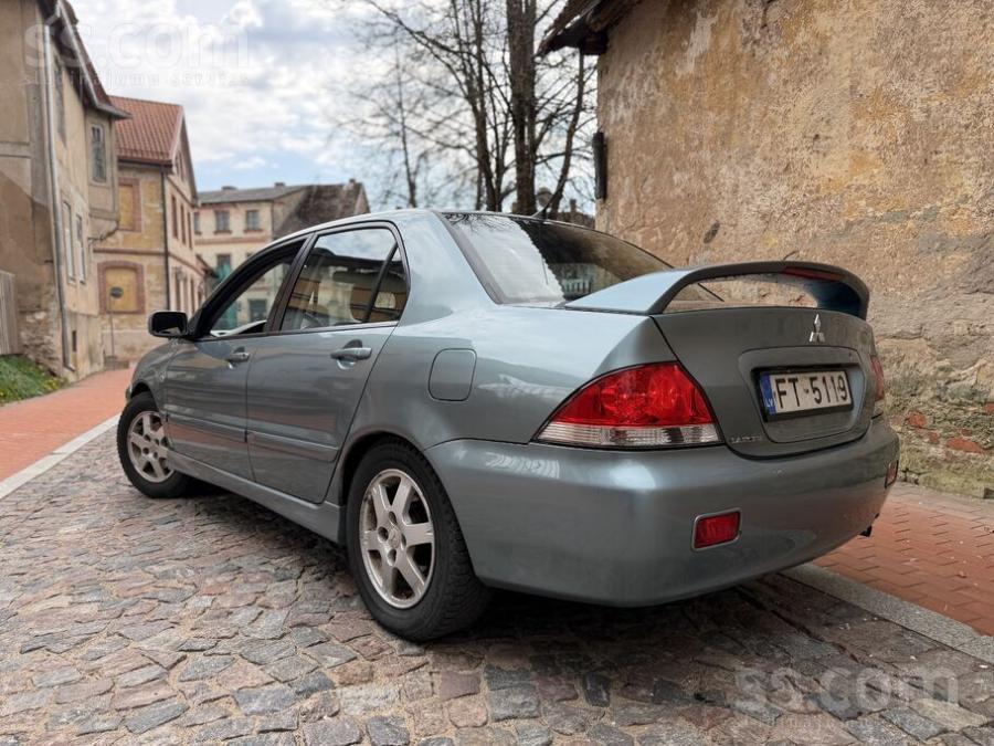 Zils Mitsubishi Lancer 2006 Cēsis, ar dzinēja tilpumu 1.60 L un nobraukumu 198 tūkst. km par 1290 €, foto 1 vietnē AUTOMOTO.COM.LV