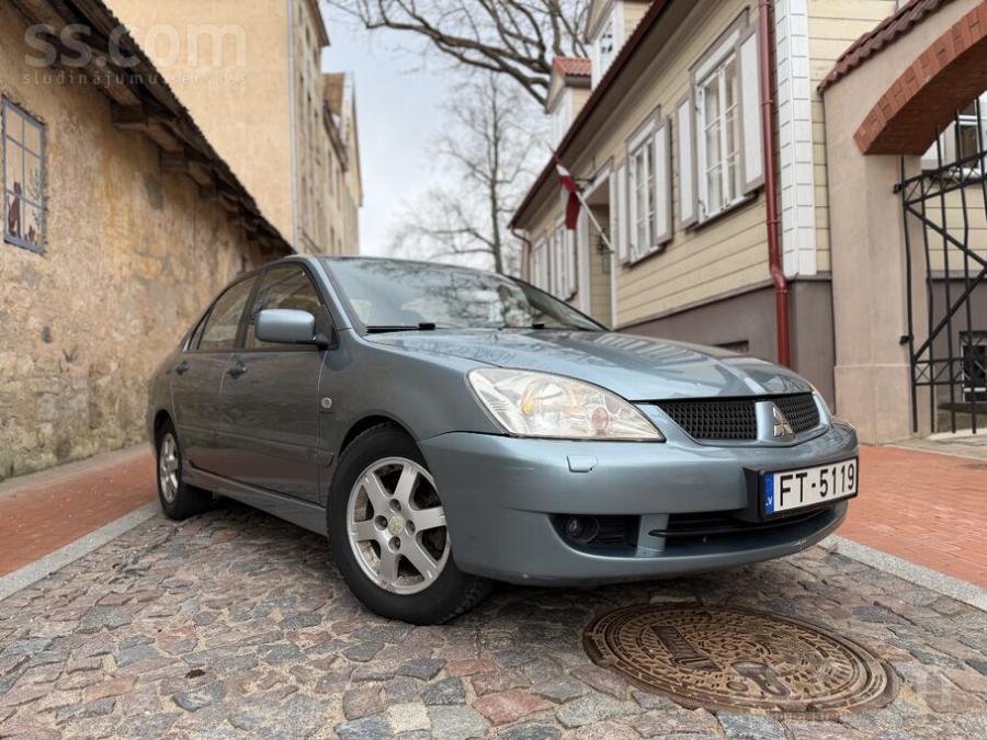 Zils Mitsubishi Lancer 2006 Cēsis, ar dzinēja tilpumu 1.60 L un nobraukumu 198 tūkst. km par 1290 €, foto 4 vietnē AUTOMOTO.COM.LV