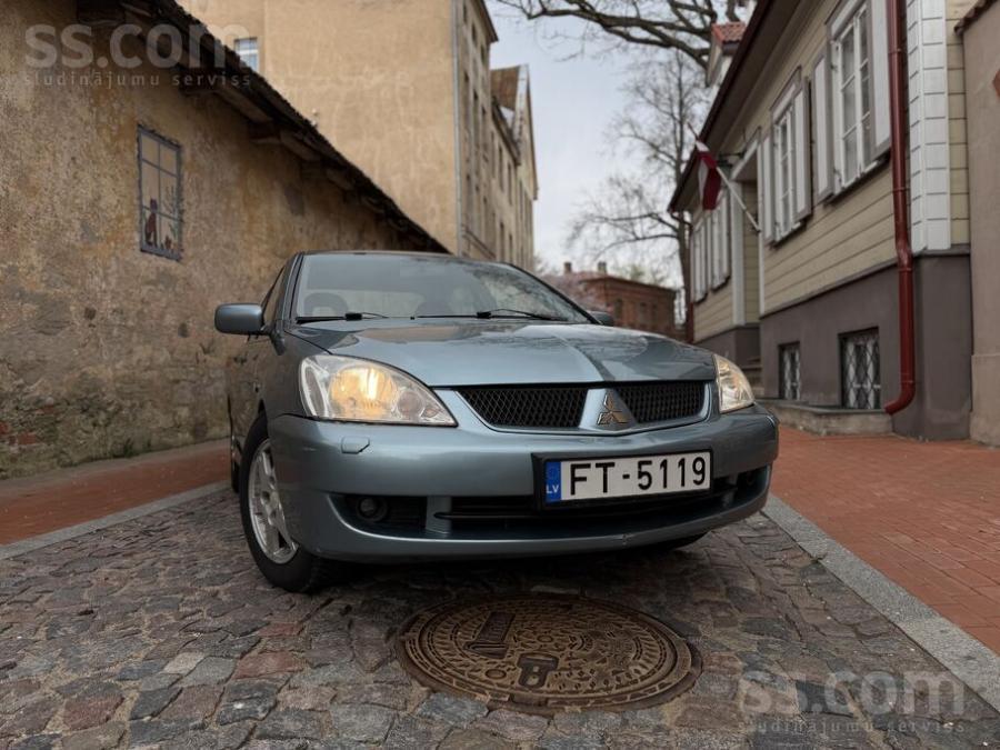 Zils Mitsubishi Lancer 2006 Cēsis, ar dzinēja tilpumu 1.60 L un nobraukumu 198 tūkst. km par 1290 €, foto 5 vietnē AUTOMOTO.COM.LV