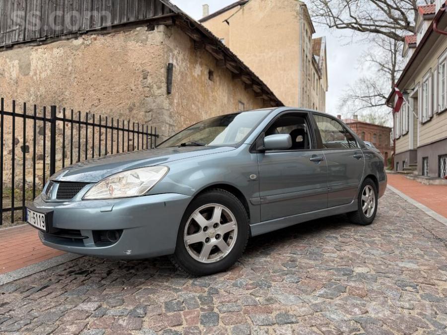Zils Mitsubishi Lancer 2006 Cēsis, ar dzinēja tilpumu 1.60 L un nobraukumu 198 tūkst. km par 1290 €, foto 9 vietnē AUTOMOTO.COM.LV