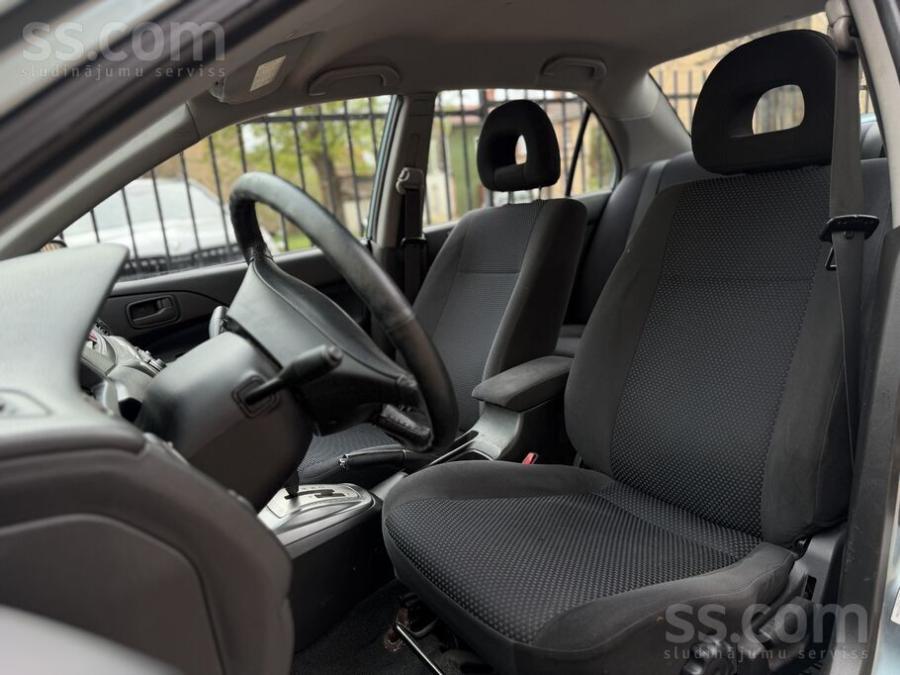 Zils Mitsubishi Lancer 2006 Cēsis, ar dzinēja tilpumu 1.60 L un nobraukumu 198 tūkst. km par 1290 €, foto 11 vietnē AUTOMOTO.COM.LV