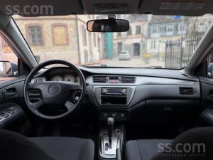 Zils Mitsubishi Lancer 2006 Cēsis, ar dzinēja tilpumu 1.60 L un nobraukumu 198 tūkst. km par 1290 €, foto 12 vietnē AUTOMOTO.COM.LV