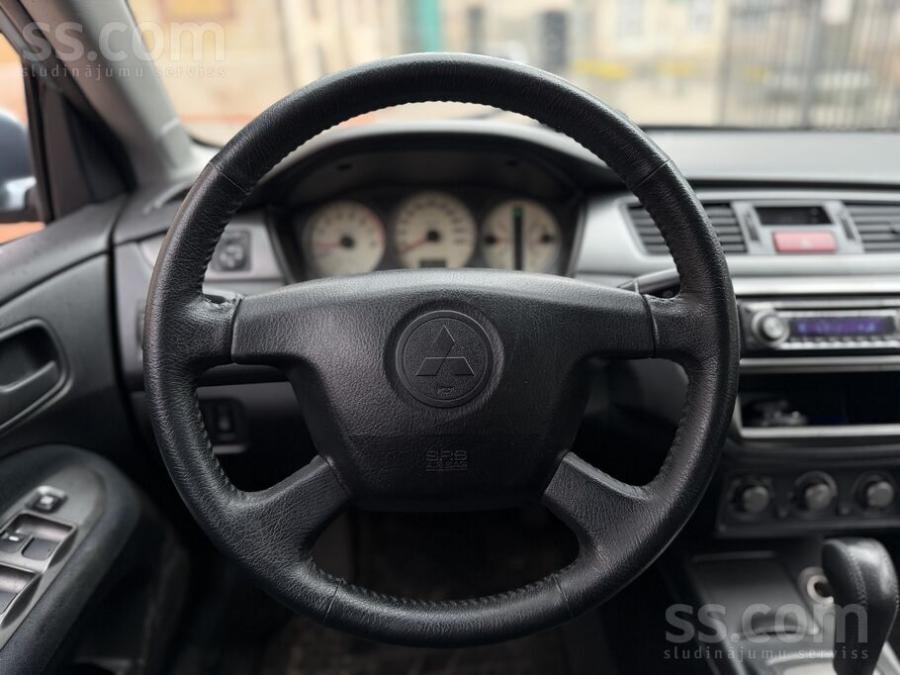 Zils Mitsubishi Lancer 2006 Cēsis, ar dzinēja tilpumu 1.60 L un nobraukumu 198 tūkst. km par 1290 €, foto 14 vietnē AUTOMOTO.COM.LV