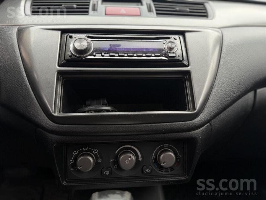 Zils Mitsubishi Lancer 2006 Cēsis, ar dzinēja tilpumu 1.60 L un nobraukumu 198 tūkst. km par 1290 €, foto 15 vietnē AUTOMOTO.COM.LV