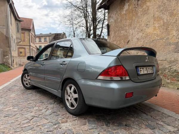 Zils Mitsubishi Lancer 2006 Cēsis, ar dzinēja tilpumu 1.60 L un nobraukumu 197 tūkst. km par 1790 €, foto 1 vietnē AUTOMOTO.COM.LV