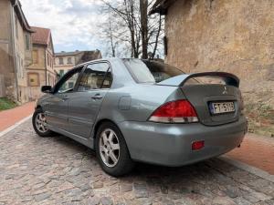 Zils Mitsubishi Lancer 2006 Cēsis, ar dzinēja tilpumu 1.60 L un nobraukumu 197 tūkst. km par 1790 €, foto  vietnē AUTOMOTO.COM.LV