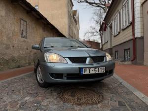 Zils Mitsubishi Lancer 2006 Cēsis, ar dzinēja tilpumu 1.60 L un nobraukumu 197 tūkst. km par 1790 €, foto 5 vietnē AUTOMOTO.COM.LV