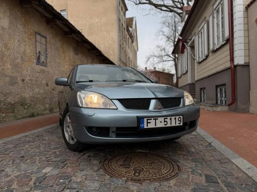 Zils Mitsubishi Lancer 2006 Cēsis, ar dzinēja tilpumu 1.60 L un nobraukumu 197 tūkst. km par 1790 €, foto 5 vietnē AUTOMOTO.COM.LV