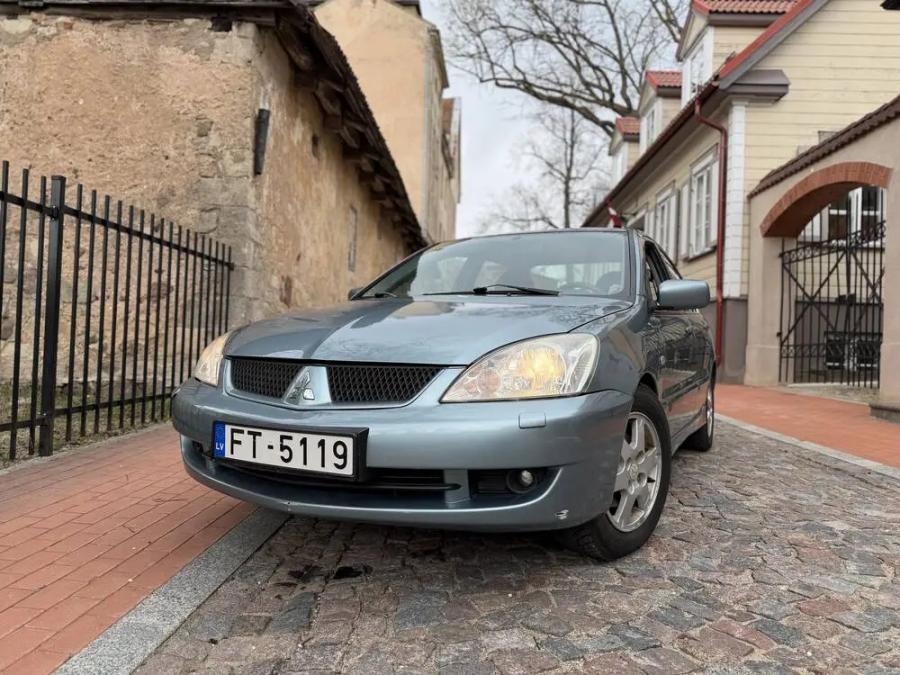 Zils Mitsubishi Lancer 2006 Cēsis, ar dzinēja tilpumu 1.60 L un nobraukumu 197 tūkst. km par 1790 €, foto 6 vietnē AUTOMOTO.COM.LV
