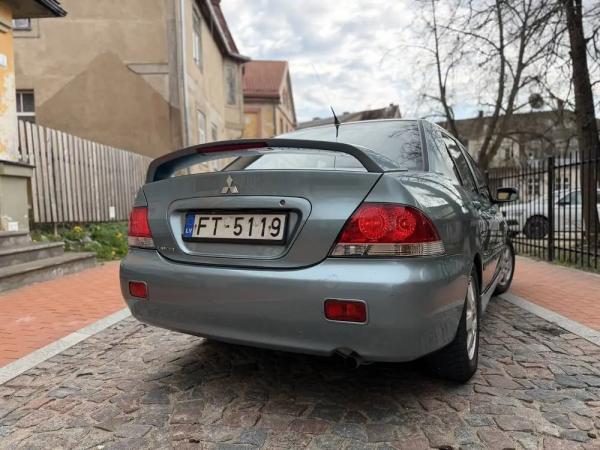 Zils Mitsubishi Lancer 2006 Cēsis, ar dzinēja tilpumu 1.60 L un nobraukumu 197 tūkst. km par 1790 €, foto 7 vietnē AUTOMOTO.COM.LV