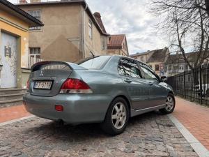 Zils Mitsubishi Lancer 2006 Cēsis, ar dzinēja tilpumu 1.60 L un nobraukumu 197 tūkst. km par 1790 €, foto 9 vietnē AUTOMOTO.COM.LV