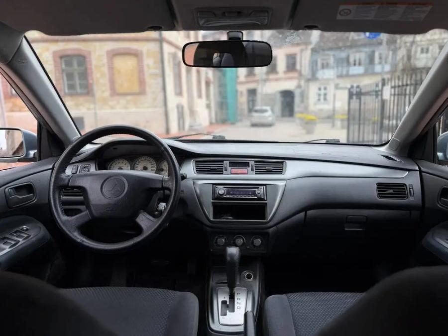 Zils Mitsubishi Lancer 2006 Cēsis, ar dzinēja tilpumu 1.60 L un nobraukumu 197 tūkst. km par 1790 €, foto 12 vietnē AUTOMOTO.COM.LV