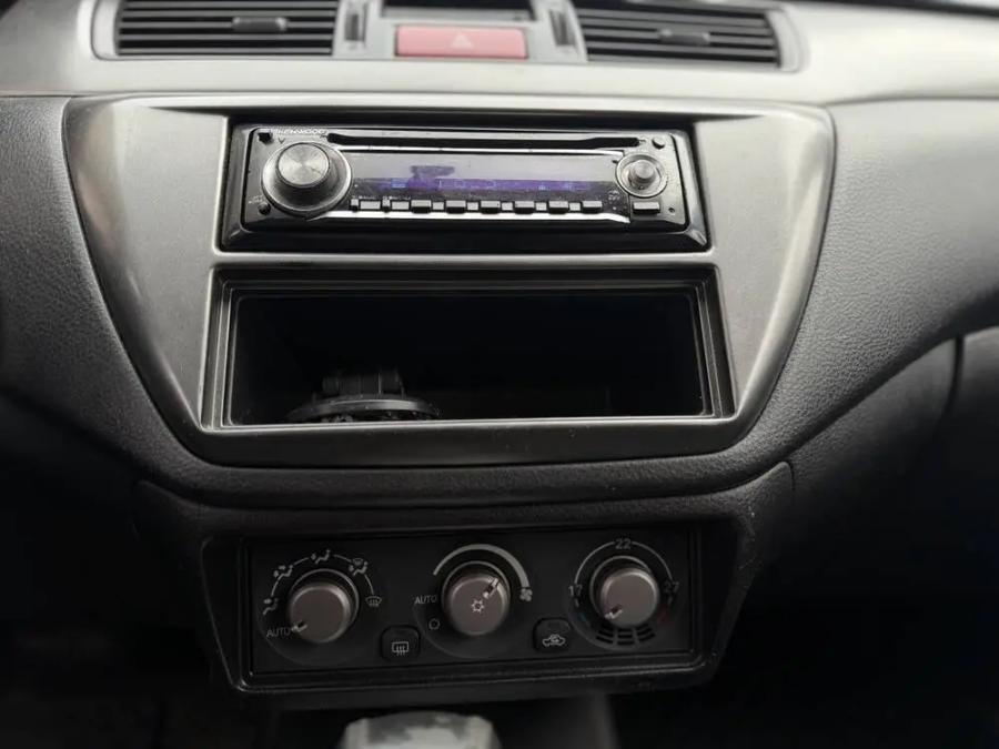 Zils Mitsubishi Lancer 2006 Cēsis, ar dzinēja tilpumu 1.60 L un nobraukumu 197 tūkst. km par 1790 €, foto 14 vietnē AUTOMOTO.COM.LV