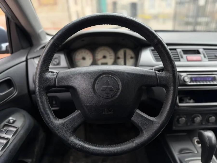Zils Mitsubishi Lancer 2006 Cēsis, ar dzinēja tilpumu 1.60 L un nobraukumu 197 tūkst. km par 1790 €, foto 15 vietnē AUTOMOTO.COM.LV