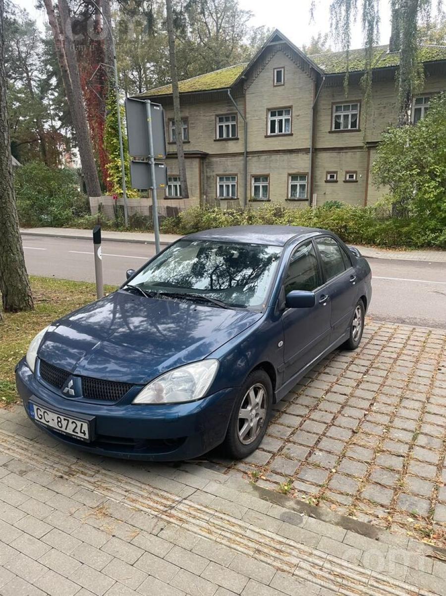 Blue Mitsubishi Lancer 2006 in Jurmala, with an engine capacity of 1.60 L and mileage of 185 thousand km for 500 €, photo 1 on AUTOMOTO.COM.LV