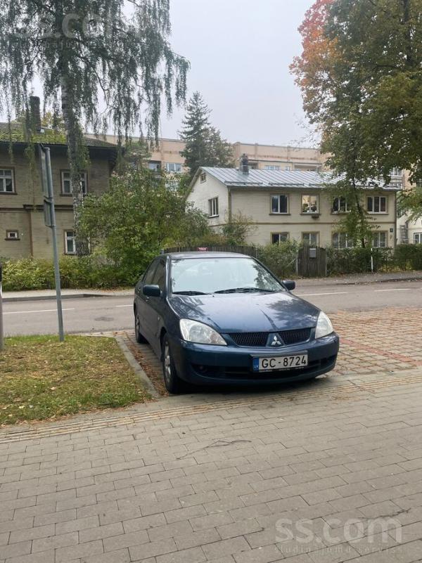 Blue Mitsubishi Lancer 2006 in Jurmala, with an engine capacity of 1.60 L and mileage of 185 thousand km for 500 €, photo 3 on AUTOMOTO.COM.LV