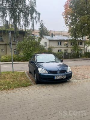 Blue Mitsubishi Lancer 2006 in Jurmala, with an engine capacity of 1.60 L and mileage of 185 thousand km for 500 €, photo 3 on AUTOMOTO.COM.LV