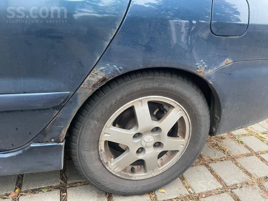Blue Mitsubishi Lancer 2006 in Jurmala, with an engine capacity of 1.60 L and mileage of 185 thousand km for 500 €, photo 5 on AUTOMOTO.COM.LV