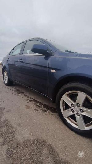 Zils Mitsubishi Lancer 2007 Kauņa, ar dzinēja tilpumu 1.50 L un nobraukumu 201 tūkst. km par 2750 €, foto 13 vietnē AUTOMOTO.COM.LV