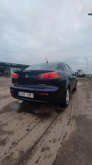 Zils Mitsubishi Lancer 2007 Kauņa, ar dzinēja tilpumu 1.50 L un nobraukumu 201 tūkst. km par 2750 €, foto 15 vietnē AUTOMOTO.COM.LV