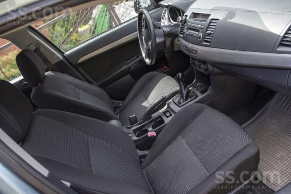 Blue Mitsubishi Lancer 2008 in Jelgava, with an engine capacity of 1.50 L and mileage of 237 thousand km for 590 €, photo 6 on AUTOMOTO.COM.LV
