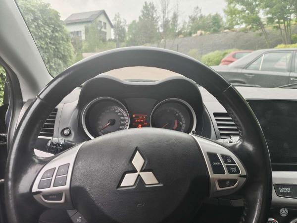 Zils Mitsubishi Lancer 2008 Viļņa, ar dzinēja tilpumu 1.97 L un nobraukumu 30 tūkst. km par 1200 €, foto 6 vietnē AUTOMOTO.COM.LV
