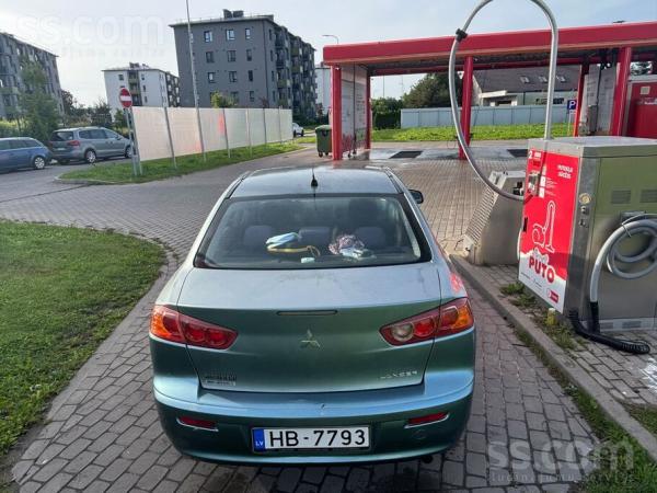 Blue Mitsubishi Lancer 2008 in Riga, with an engine capacity of 1.80 L and mileage of 294 thousand km for 1500 €, photo 3 on AUTOMOTO.COM.LV