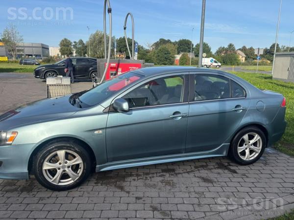 Blue Mitsubishi Lancer 2008 in Riga, with an engine capacity of 1.80 L and mileage of 294 thousand km for 1500 €, photo 5 on AUTOMOTO.COM.LV