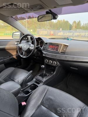 Zils Mitsubishi Lancer 2008 Jēkabpils, ar dzinēja tilpumu 2.00 L un nobraukumu 268 tūkst. km par 1800 €, foto 12 vietnē AUTOMOTO.COM.LV