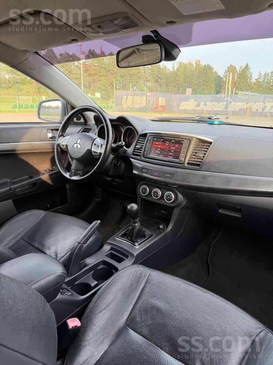 Zils Mitsubishi Lancer 2008 Jēkabpils, ar dzinēja tilpumu 2.00 L un nobraukumu 268 tūkst. km par 1800 €, foto 12 vietnē AUTOMOTO.COM.LV