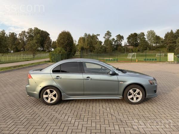 Zils Mitsubishi Lancer 2008 Jēkabpils, ar dzinēja tilpumu 2.00 L un nobraukumu 268 tūkst. km par 1800 €, foto 6 vietnē AUTOMOTO.COM.LV