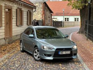 Blue Mitsubishi Lancer 2008 in Cesis, with an engine capacity of 2.00 L and mileage of 269 thousand km for 1999 €, photo 4 on AUTOMOTO.COM.LV