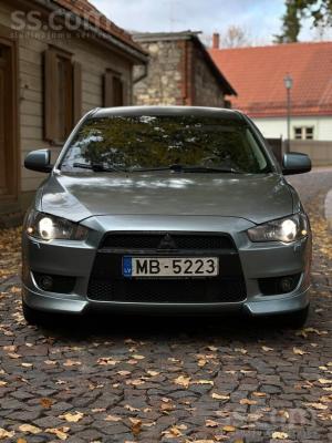 Blue Mitsubishi Lancer 2008 in Cesis, with an engine capacity of 2.00 L and mileage of 269 thousand km for 1999 €, photo 7 on AUTOMOTO.COM.LV