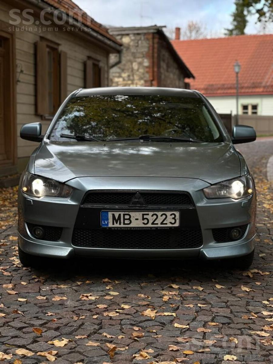 Blue Mitsubishi Lancer 2008 in Cesis, with an engine capacity of 2.00 L and mileage of 269 thousand km for 1999 €, photo 7 on AUTOMOTO.COM.LV