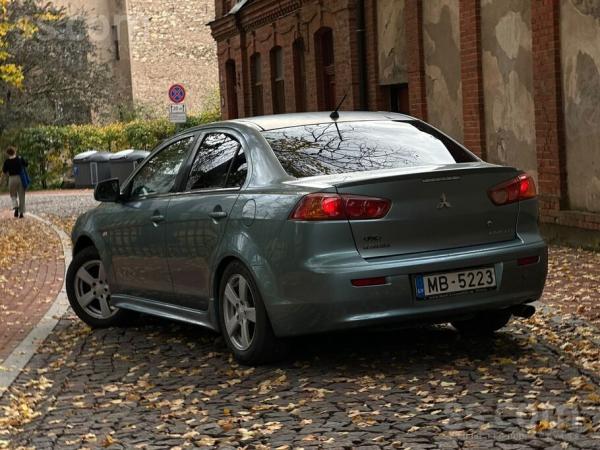 Blue Mitsubishi Lancer 2008 in Cesis, with an engine capacity of 2.00 L and mileage of 269 thousand km for 1999 €, photo 8 on AUTOMOTO.COM.LV