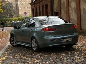 Blue Mitsubishi Lancer 2008 in Cesis, with an engine capacity of 2.00 L and mileage of 269 thousand km for 1999 €, photo 8 on AUTOMOTO.COM.LV