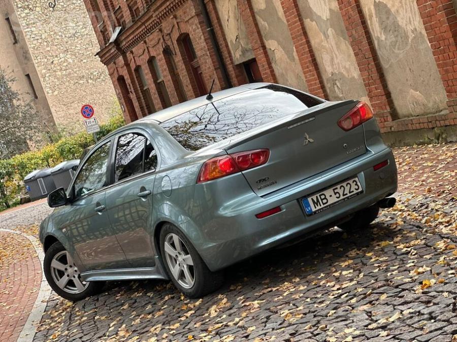 Blue Mitsubishi Lancer 2008 in Cesis, with an engine capacity of 2.00 L and mileage of 269 thousand km for 1999 €, photo 10 on AUTOMOTO.COM.LV