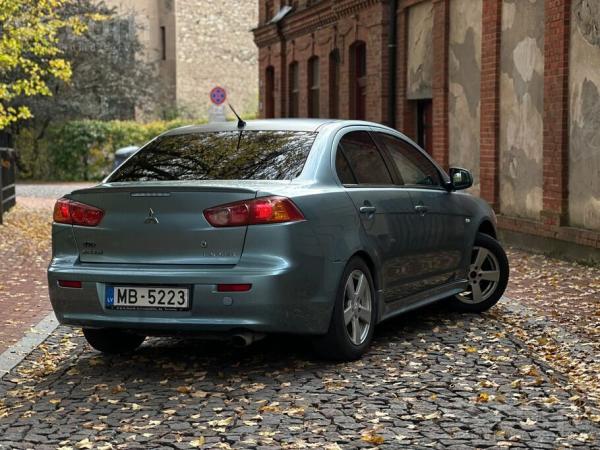 Blue Mitsubishi Lancer 2008 in Cesis, with an engine capacity of 2.00 L and mileage of 269 thousand km for 1999 €, photo 11 on AUTOMOTO.COM.LV