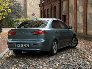 Blue Mitsubishi Lancer 2008 in Cesis, with an engine capacity of 2.00 L and mileage of 269 thousand km for 1999 €, photo 11 on AUTOMOTO.COM.LV