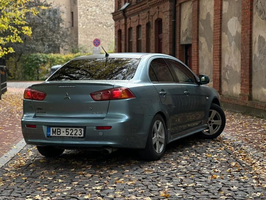 Blue Mitsubishi Lancer 2008 in Cesis, with an engine capacity of 2.00 L and mileage of 269 thousand km for 1999 €, photo 11 on AUTOMOTO.COM.LV