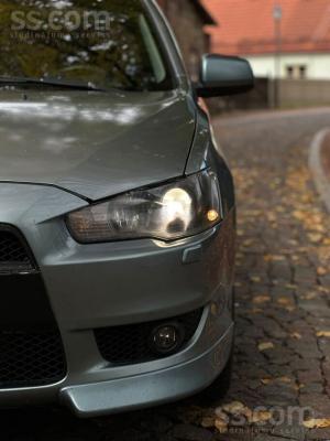 Blue Mitsubishi Lancer 2008 in Cesis, with an engine capacity of 2.00 L and mileage of 269 thousand km for 1999 €, photo 13 on AUTOMOTO.COM.LV