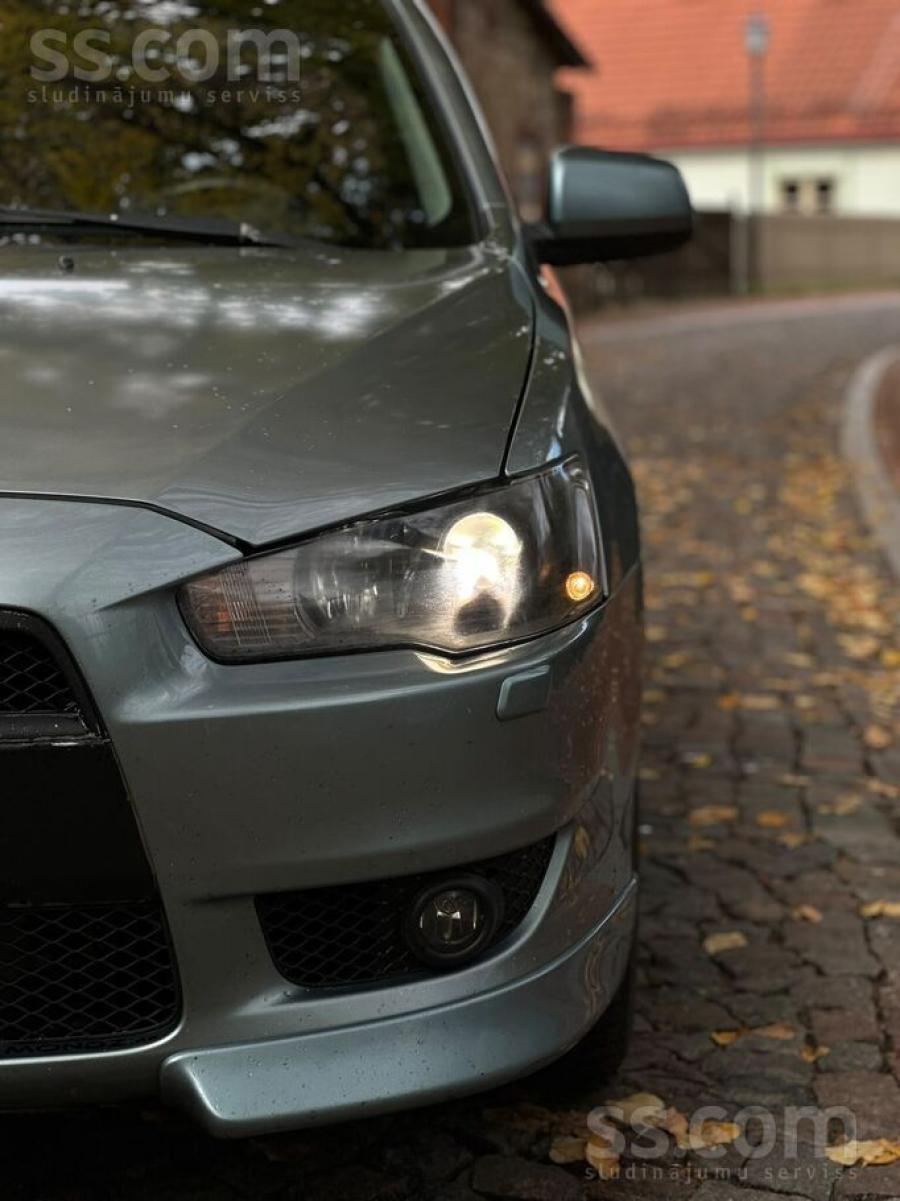 Blue Mitsubishi Lancer 2008 in Cesis, with an engine capacity of 2.00 L and mileage of 269 thousand km for 1999 €, photo 13 on AUTOMOTO.COM.LV