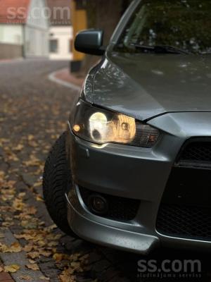 Blue Mitsubishi Lancer 2008 in Cesis, with an engine capacity of 2.00 L and mileage of 269 thousand km for 1999 €, photo 14 on AUTOMOTO.COM.LV