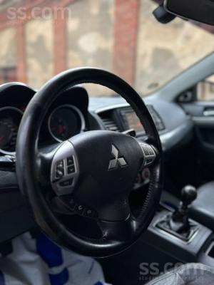 Blue Mitsubishi Lancer 2008 in Cesis, with an engine capacity of 2.00 L and mileage of 269 thousand km for 1999 €, photo 22 on AUTOMOTO.COM.LV