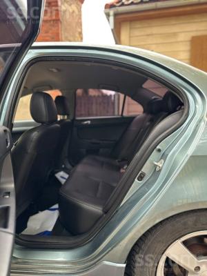 Blue Mitsubishi Lancer 2008 in Cesis, with an engine capacity of 2.00 L and mileage of 269 thousand km for 1999 €, photo 23 on AUTOMOTO.COM.LV