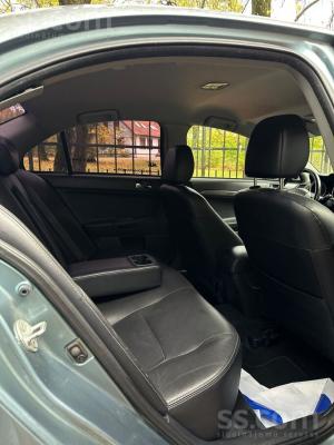 Blue Mitsubishi Lancer 2008 in Cesis, with an engine capacity of 2.00 L and mileage of 269 thousand km for 1999 €, photo 34 on AUTOMOTO.COM.LV