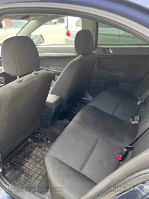 Zils Mitsubishi Lancer 2009 Tallina, ar dzinēja tilpumu 1.50 L un nobraukumu 154 tūkst. km par 2800 €, foto 8 vietnē AUTOMOTO.COM.LV